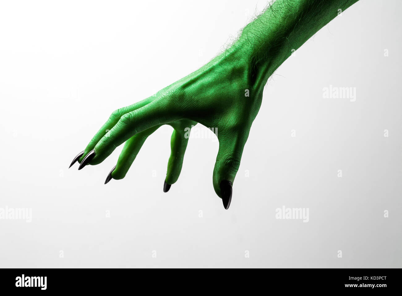 Halloween green witches or zombie monster hand Stock Photo - Alamy