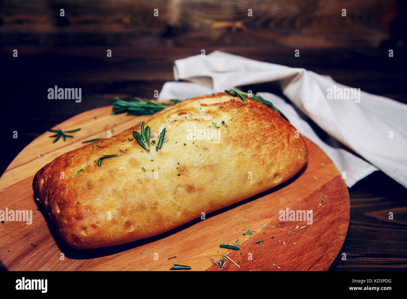 Traditional Italian ciabatta bread with herbs. Wooden background Stock ...