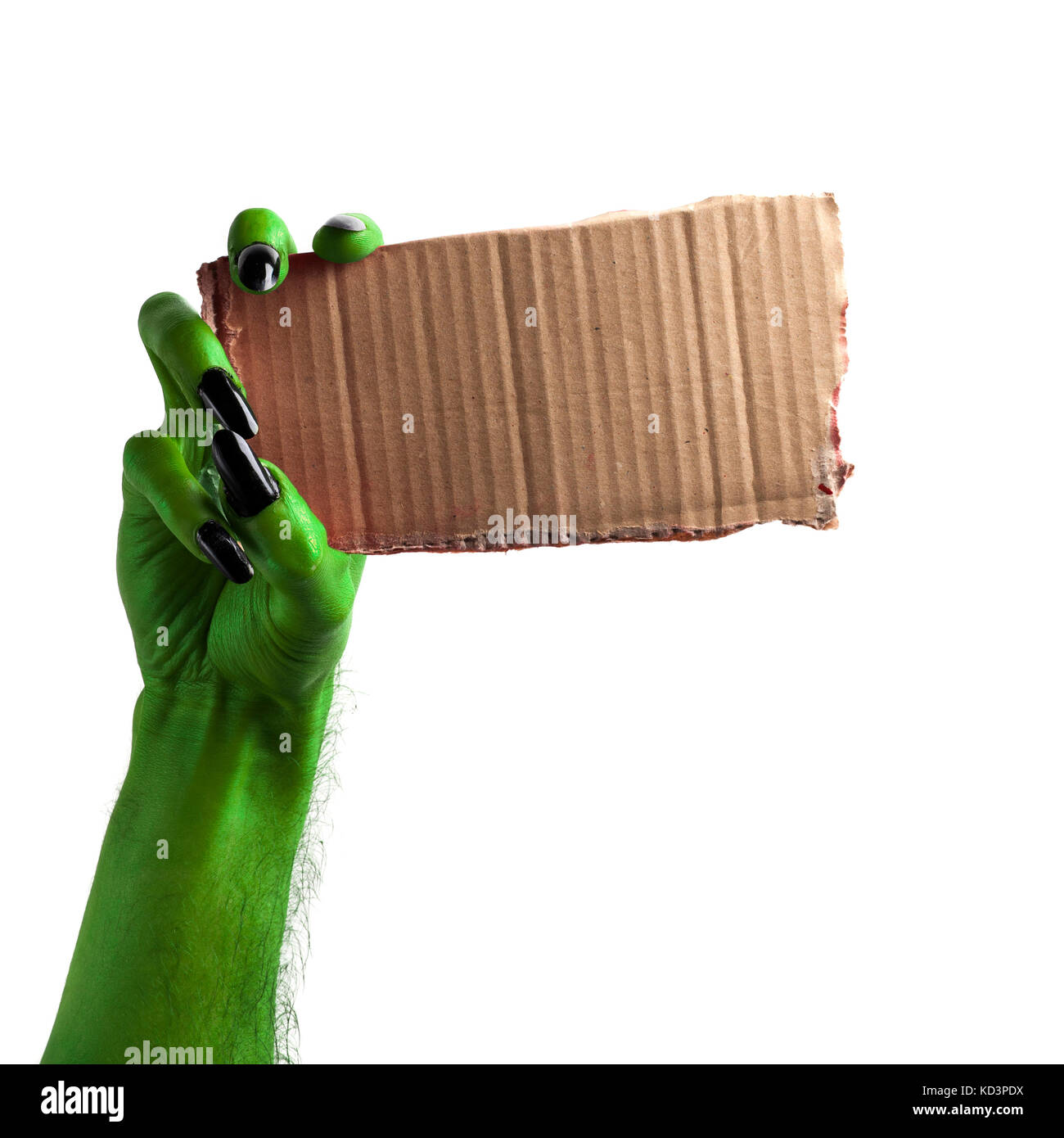 Halloween green witches or zombie monster hand holding a blank sign ...