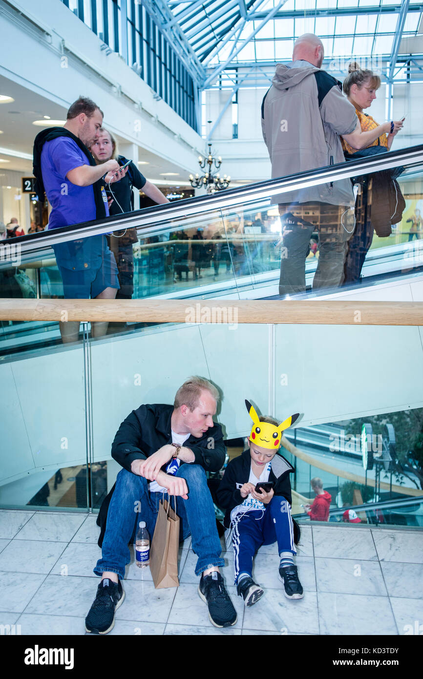 Denmark, Copenhagen – October 7, 2017. People in all ages hunt Pokémons ...