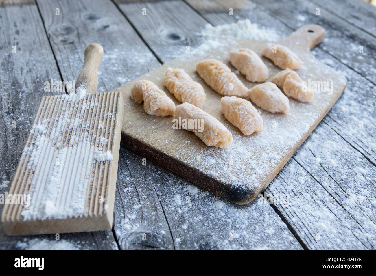 potato gnocchi cooking Italian food Stock Photo - Alamy