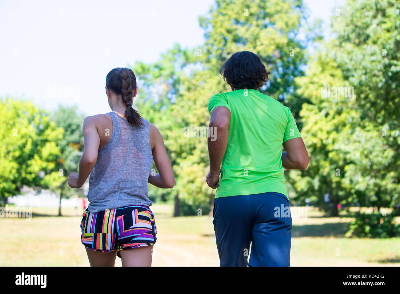 Back view sporty couple man hi-res stock photography and images - Alamy