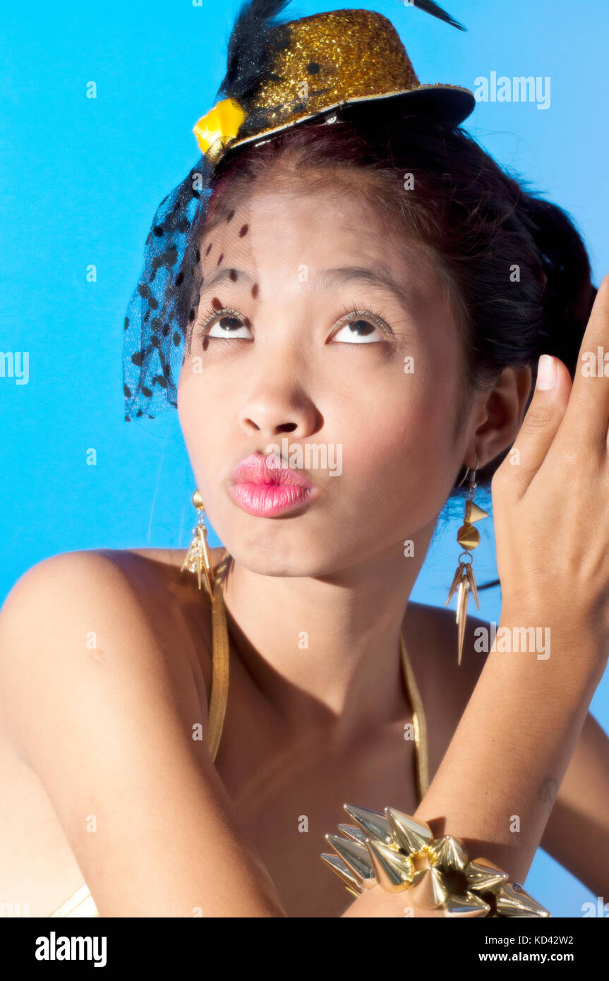 Young Asian woman with exotic accessories Stock Photo - Alamy