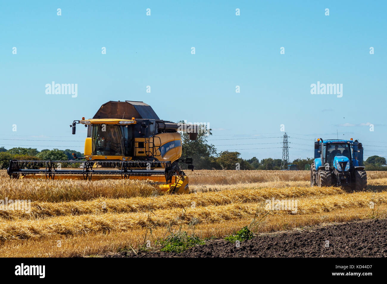 Combine Harvester at work Stock Photo - Alamy
