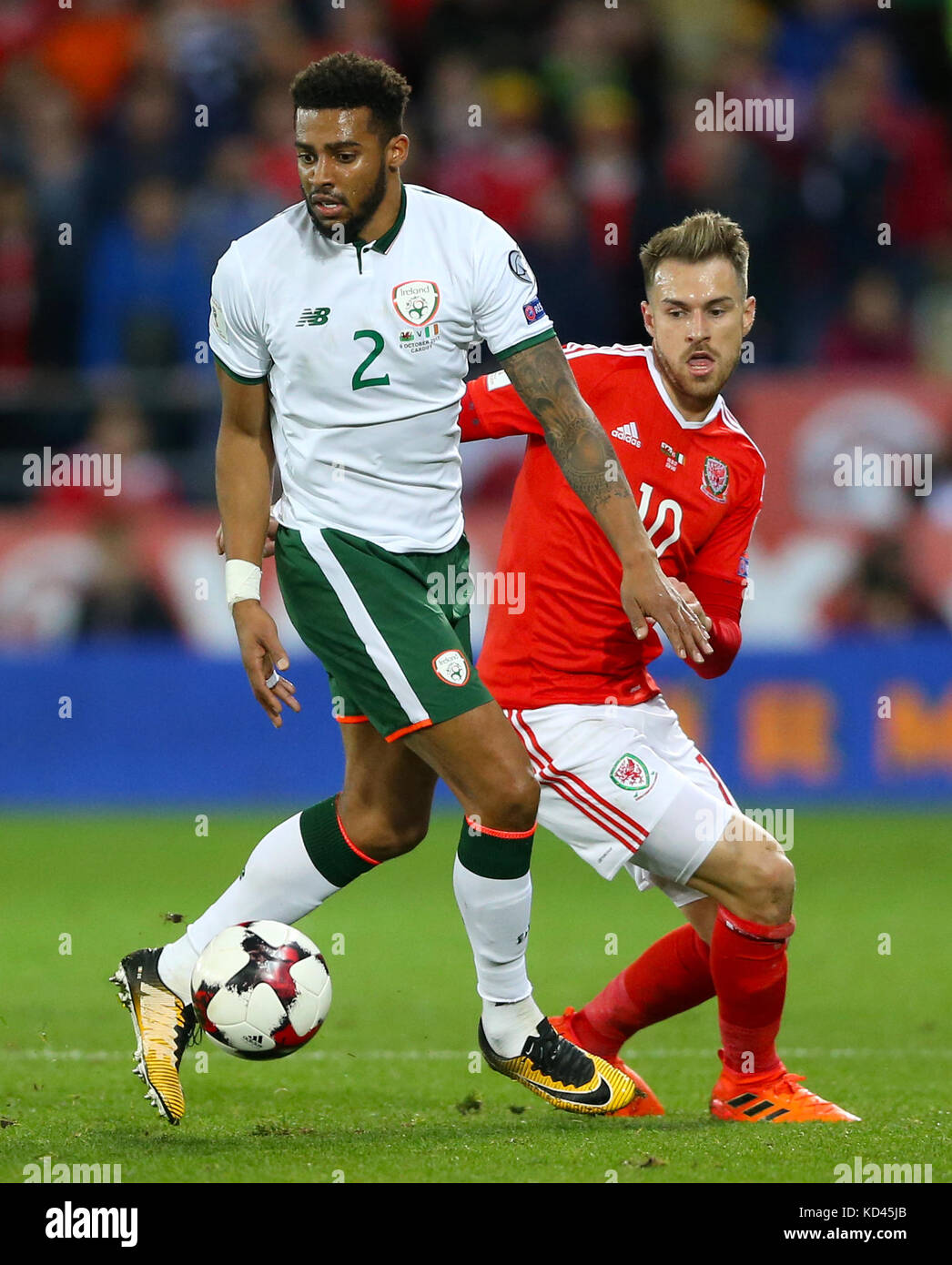 Republic of Ireland's Cyrus Christie (left) and Wales' Aaron Ramsey ...