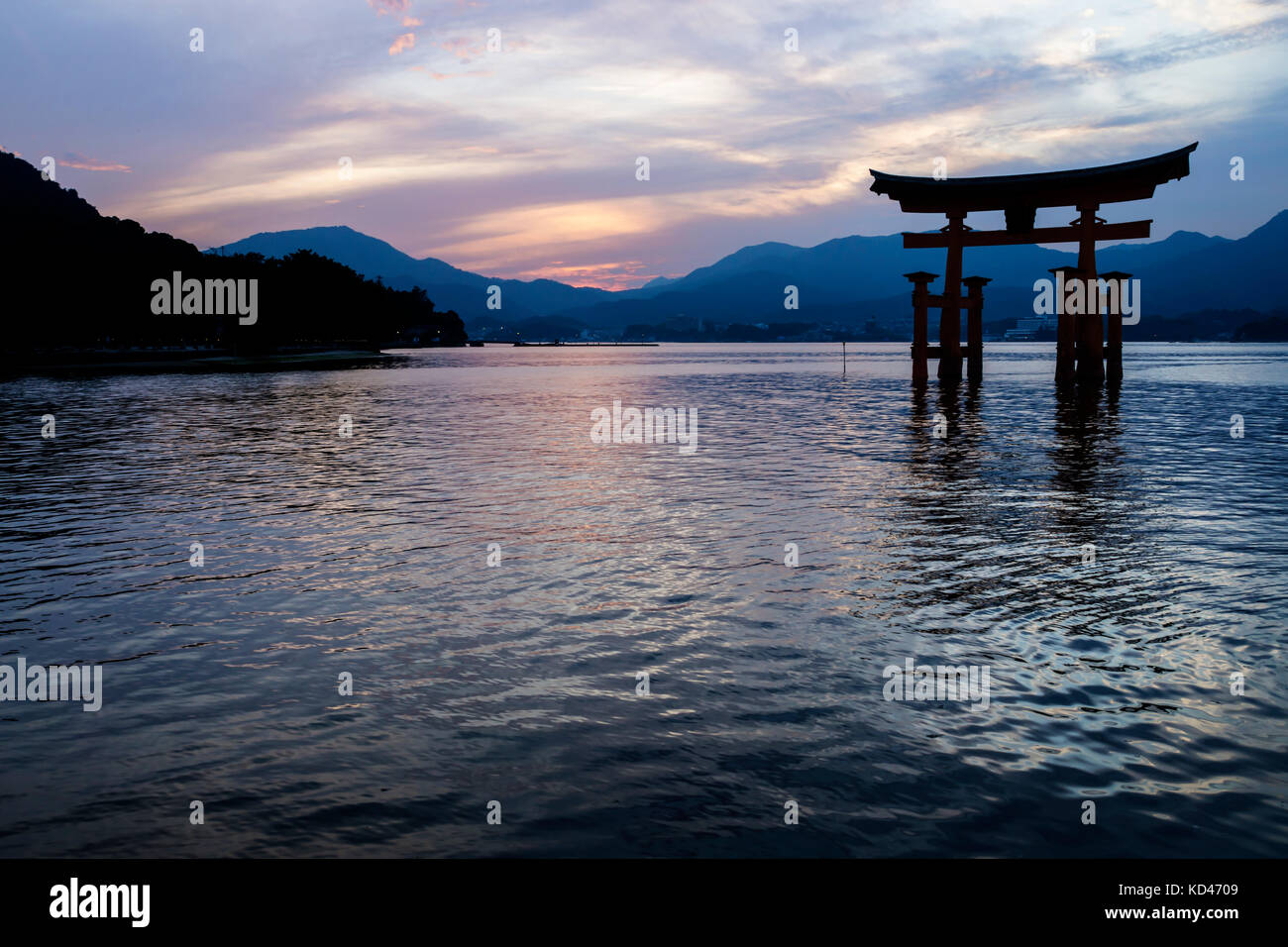 The Floating Torii gate after sunset in Miyajima, Japan Stock Photo - Alamy