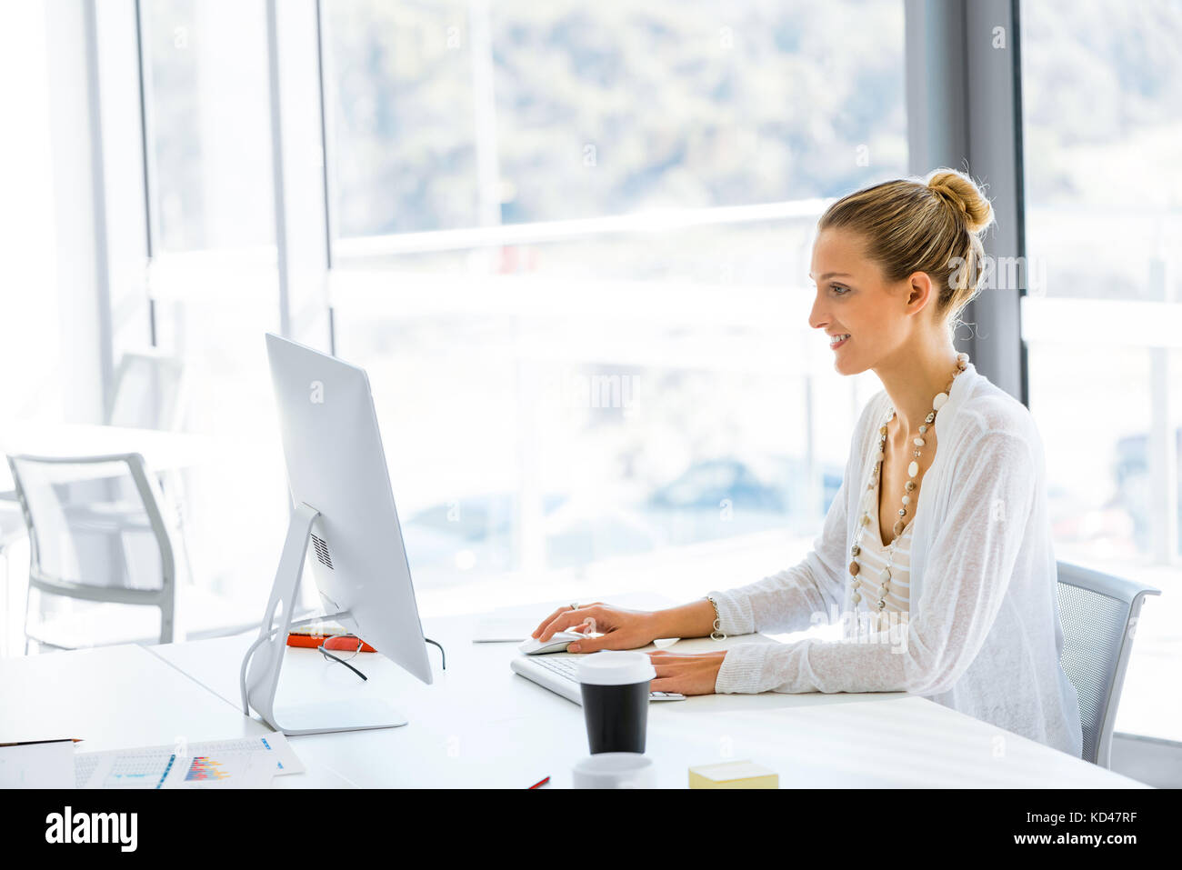 Elegant office worker Stock Photo - Alamy