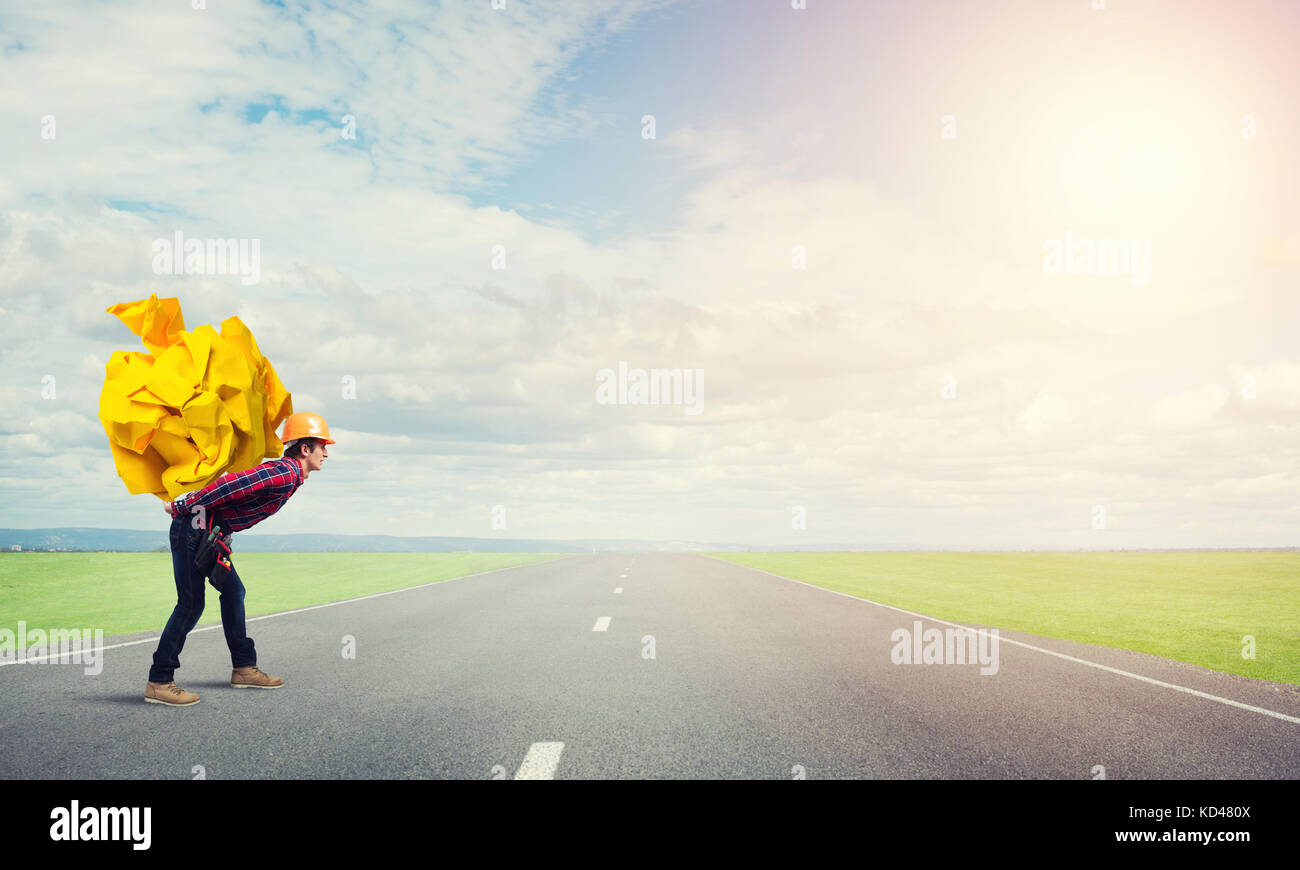 Engineer man carry load Stock Photo - Alamy