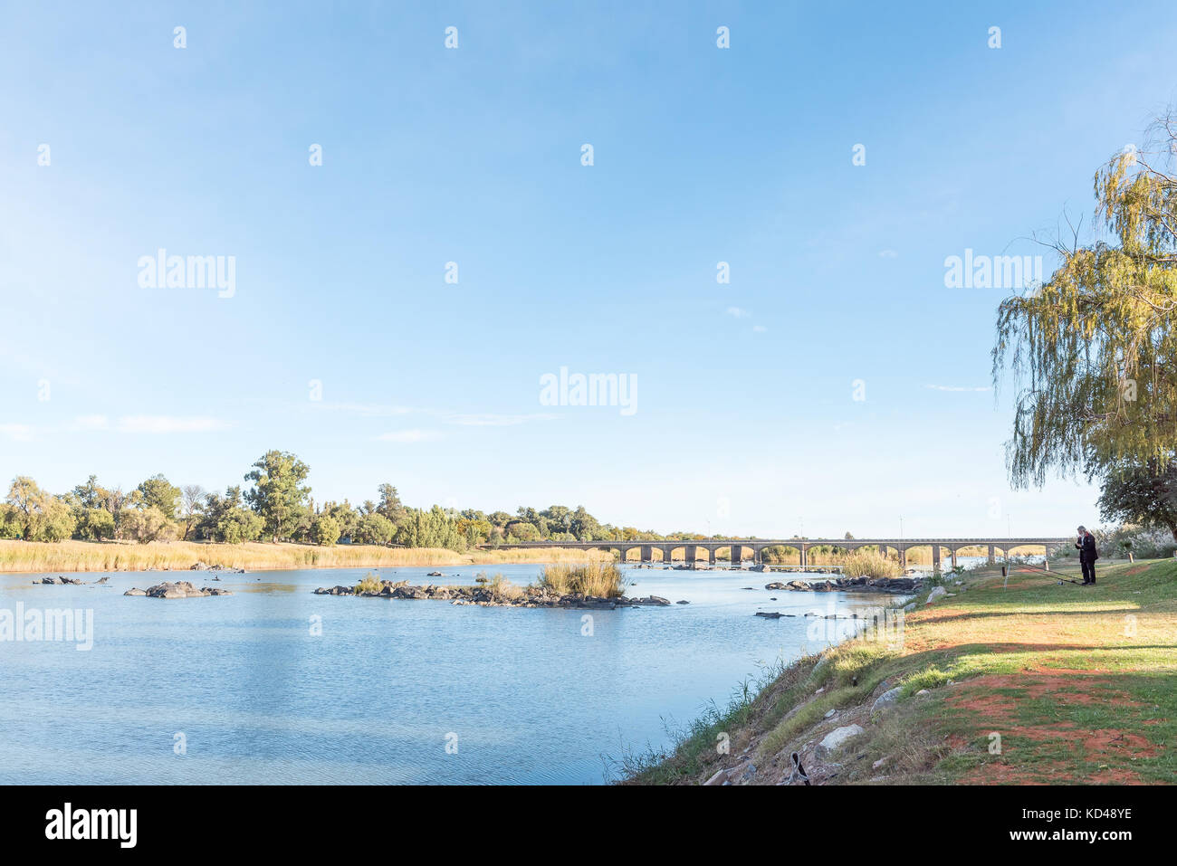 UPINGTON, SOUTH AFRICA - JUNE 11, 2017: An angler on the banks of the ...