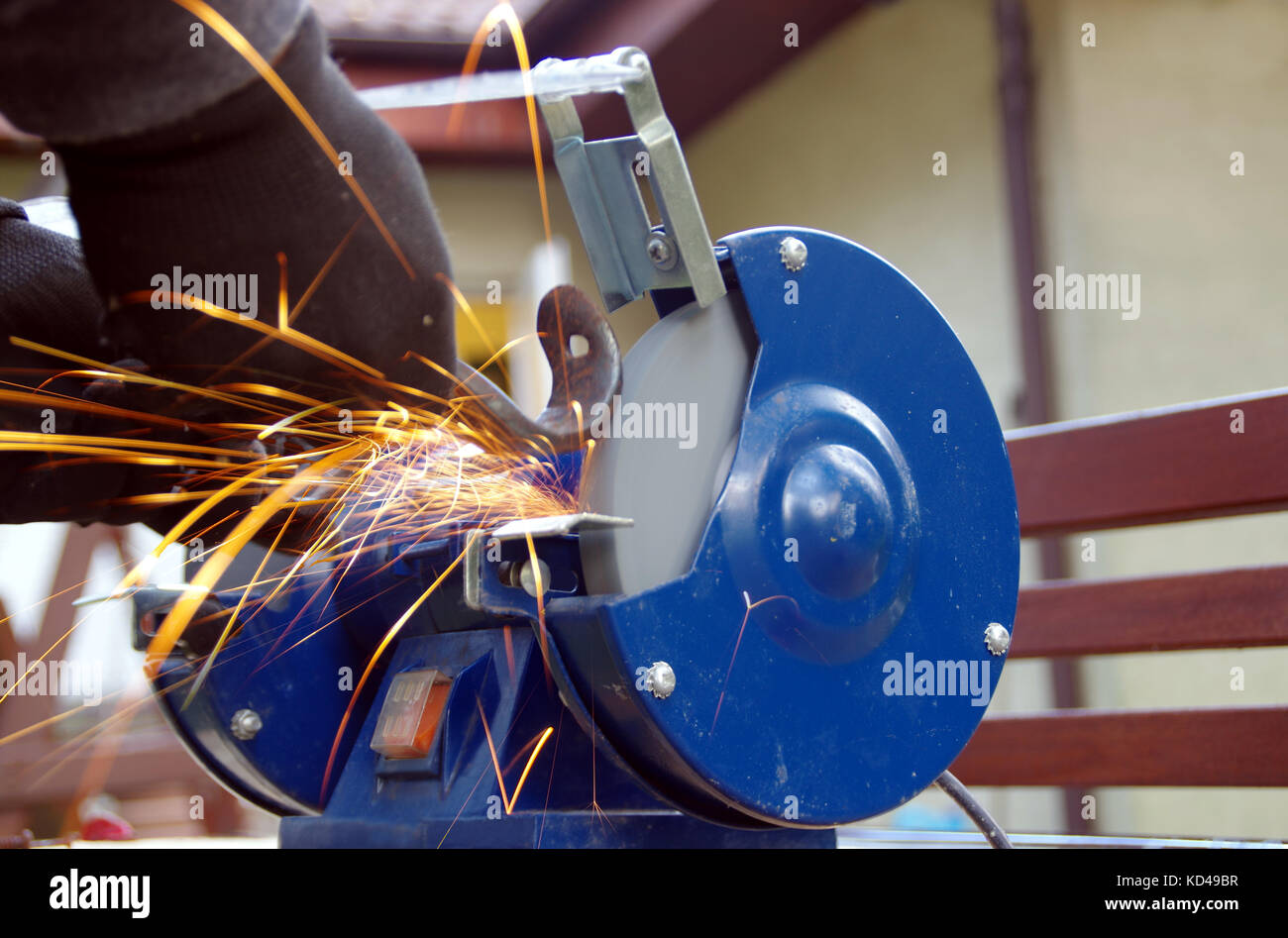 Electric wheel grinding with light sparks and gleam. Industry theme ...