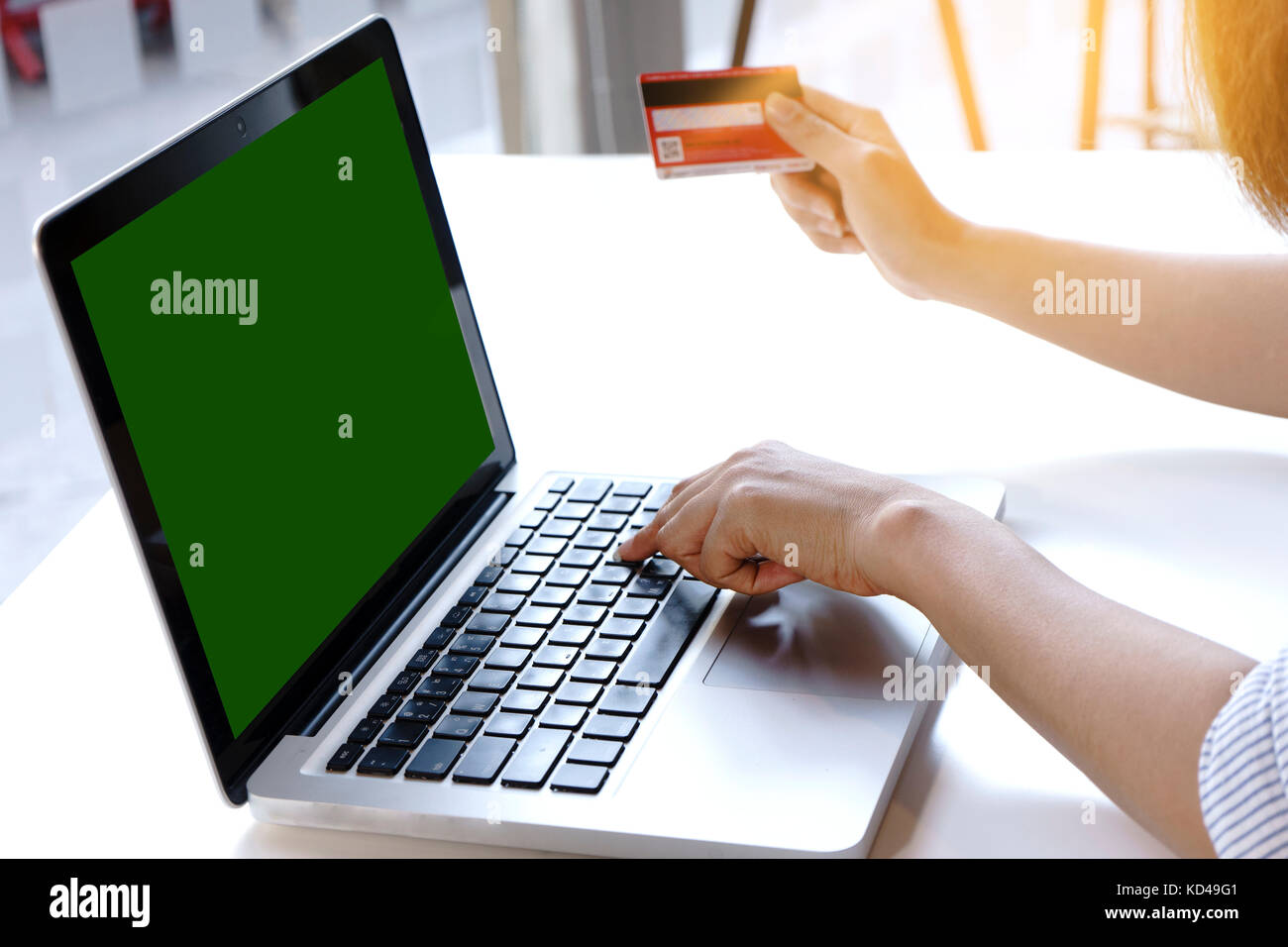 woman sitting use computer for pay the money for her shopping online ...