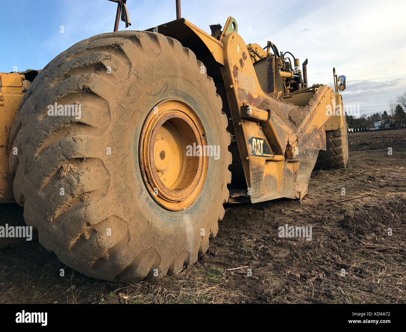 Earth moving machines at construction site Stock Photo - Alamy