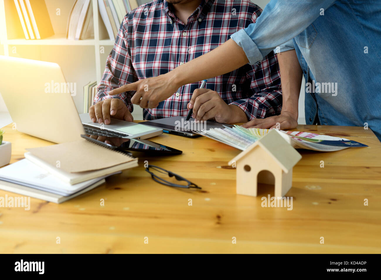 Team work for graphic design working on wood table with computer tablet ...
