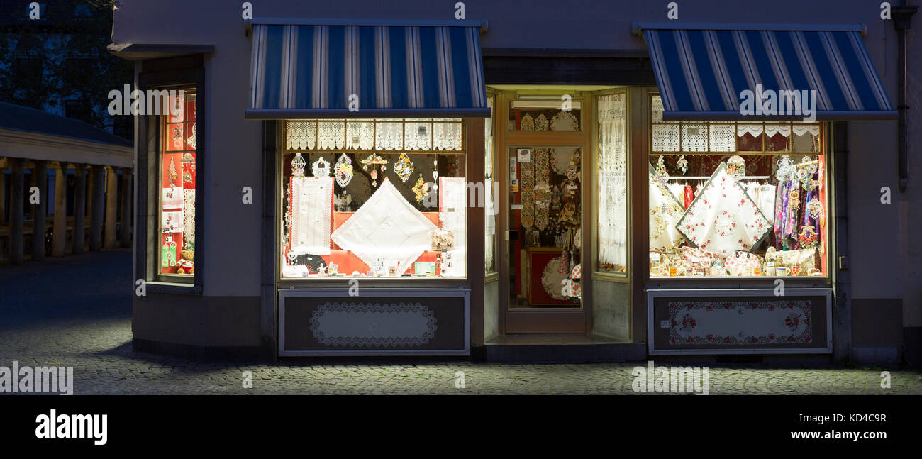 Shop window of traditional lace and linen gifts and souvenirs in shop ...