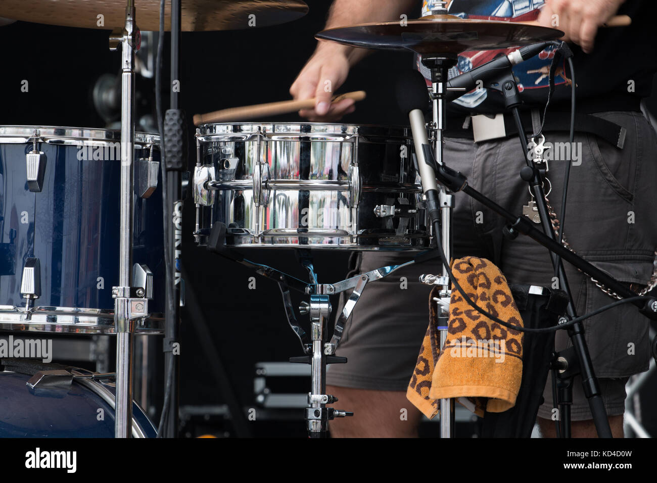 Close view detail of a drummer playing on a concert Stock Photo - Alamy