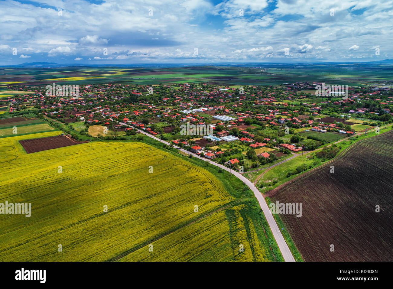 Aerial view over Village countryside in the middle of the valley and ...