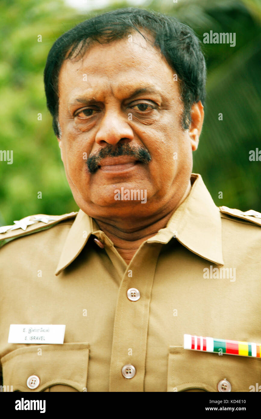 Indian police officer looking at camera Stock Photo - Alamy