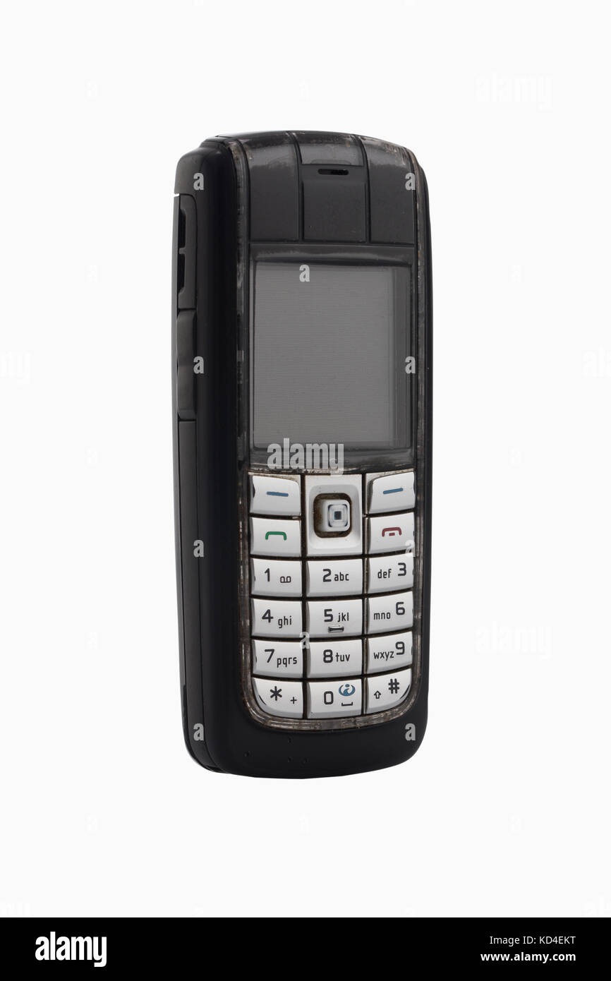 Old-fashioned portable telephone isolated on white Stock Photo - Alamy