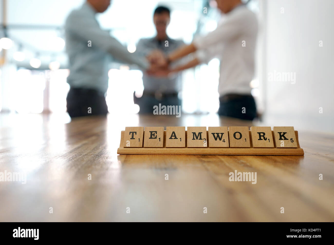 Key word teamwork on wood table part of business working. Concept work ...