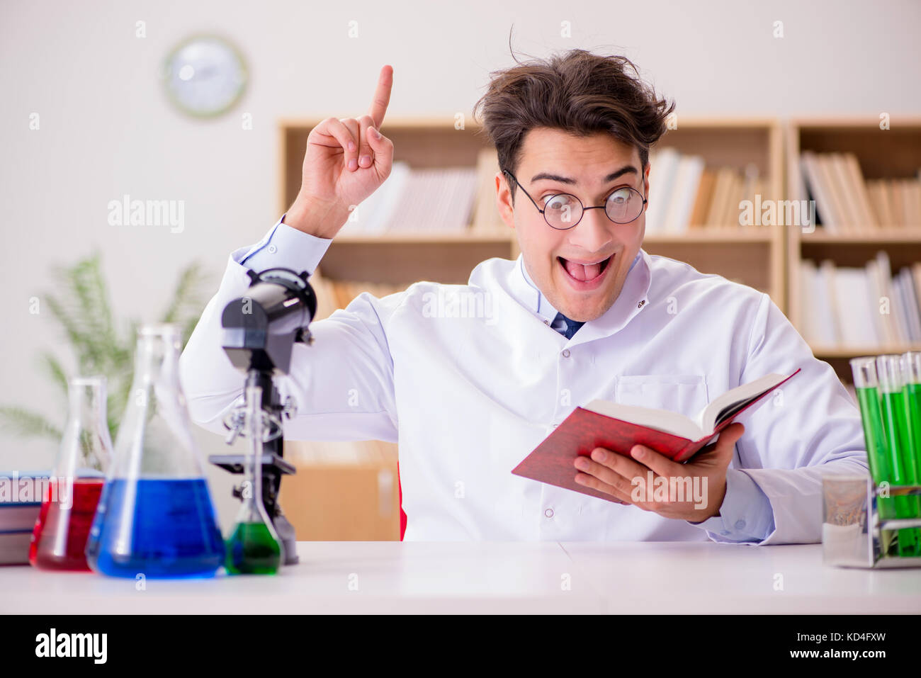 Mad crazy scientist doctor doing experiments in a laboratory Stock ...