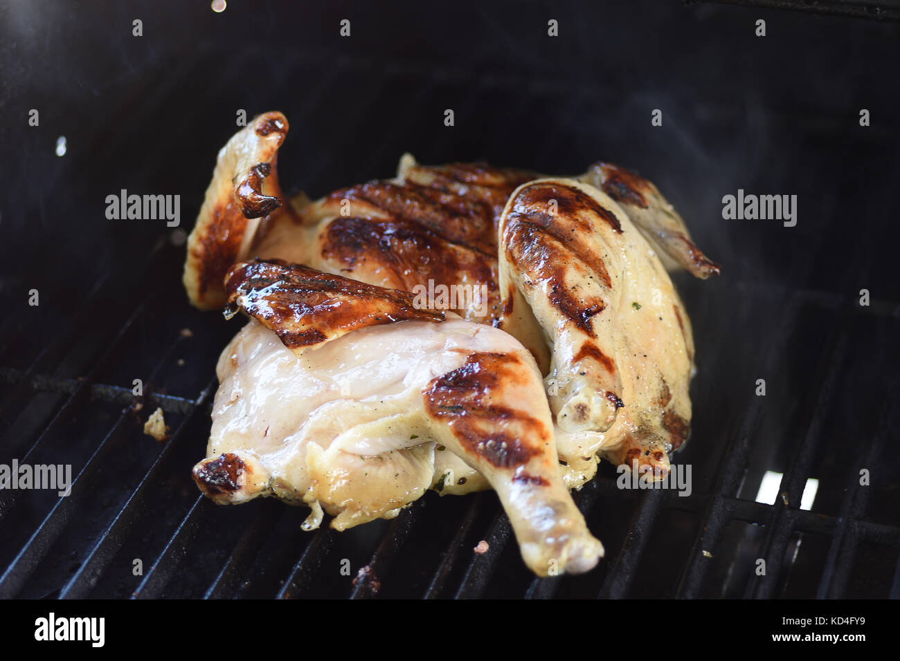Chicken being cooked hi-res stock photography and images - Alamy