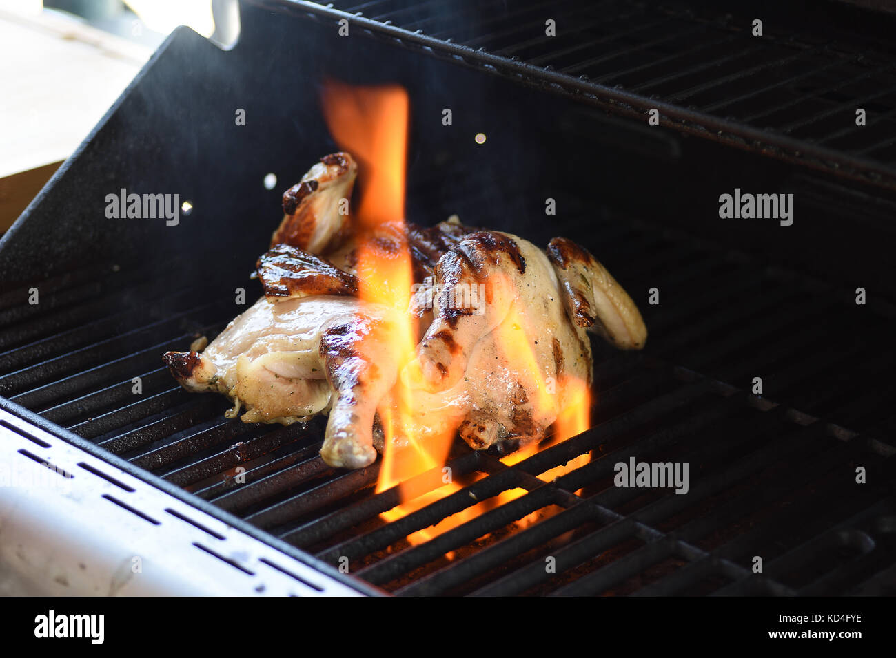 Chicken being cooked hi-res stock photography and images - Alamy