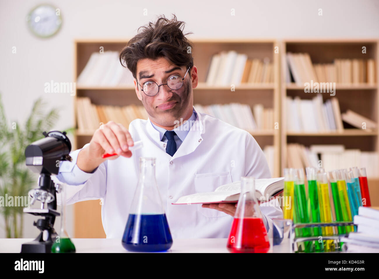 Mad crazy scientist doctor doing experiments in a laboratory Stock ...