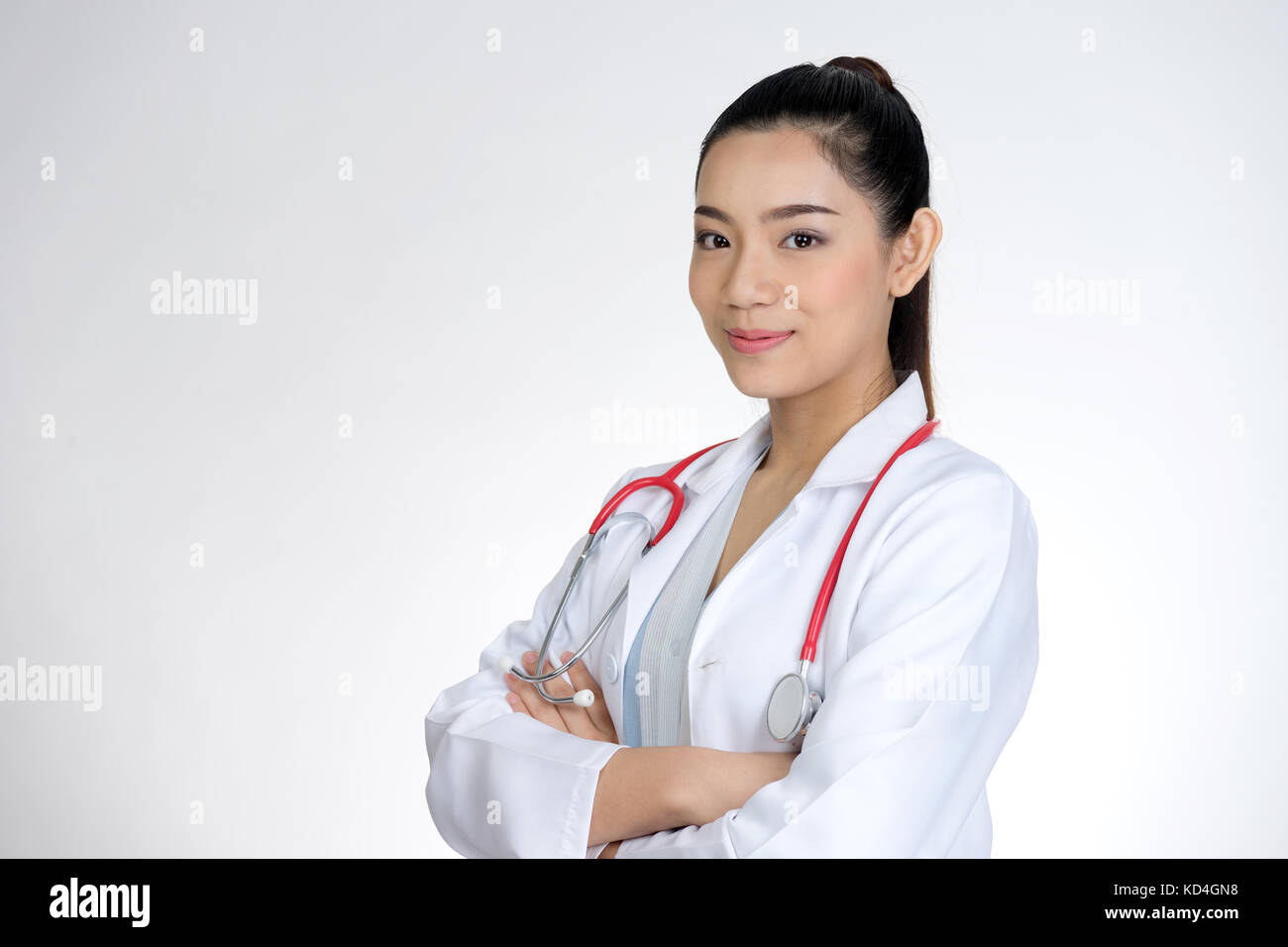 woman doctor portrait pose and happy smile on white background Stock ...