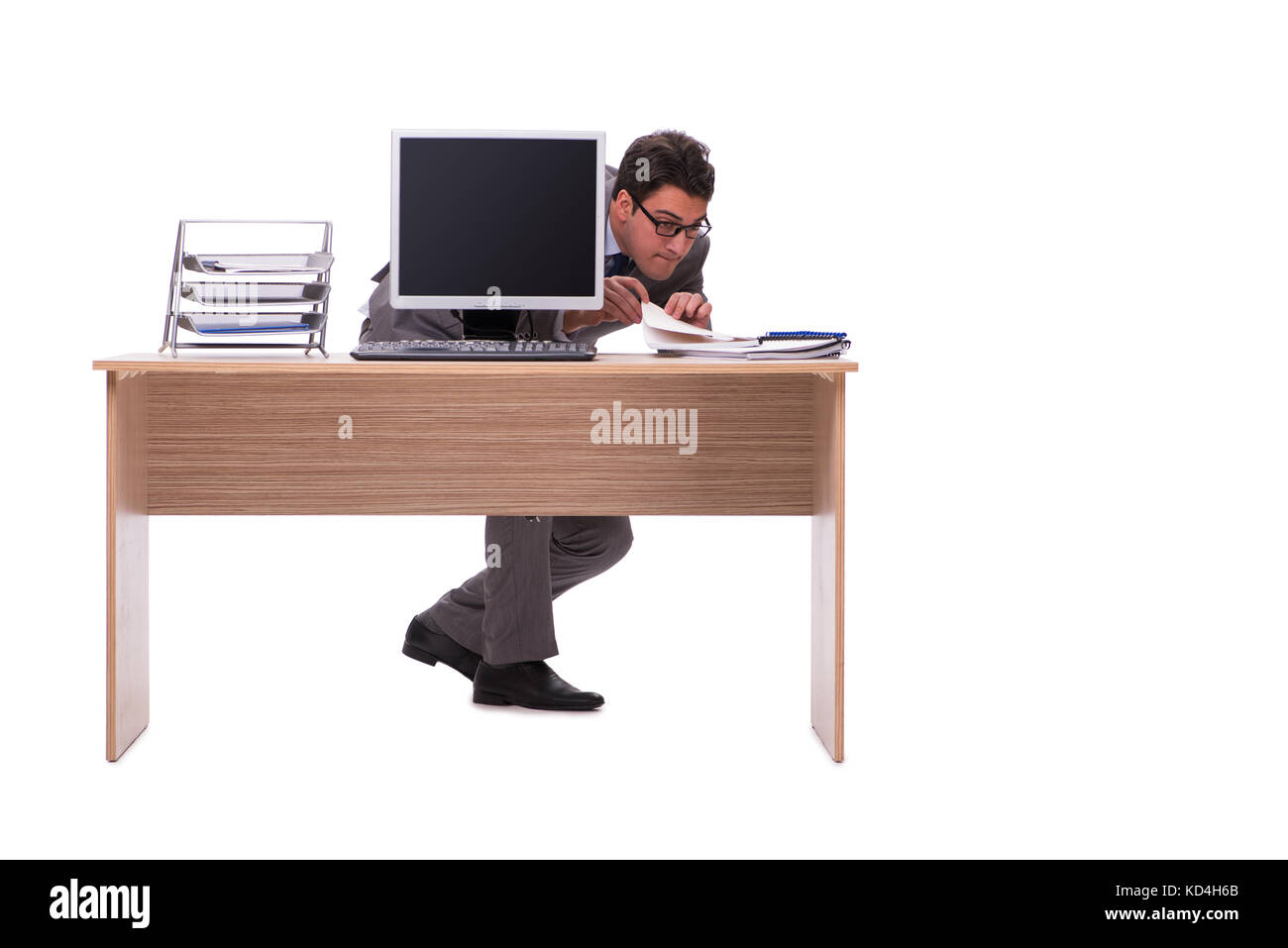 Businessman hiding in the office isolated on white Stock Photo - Alamy