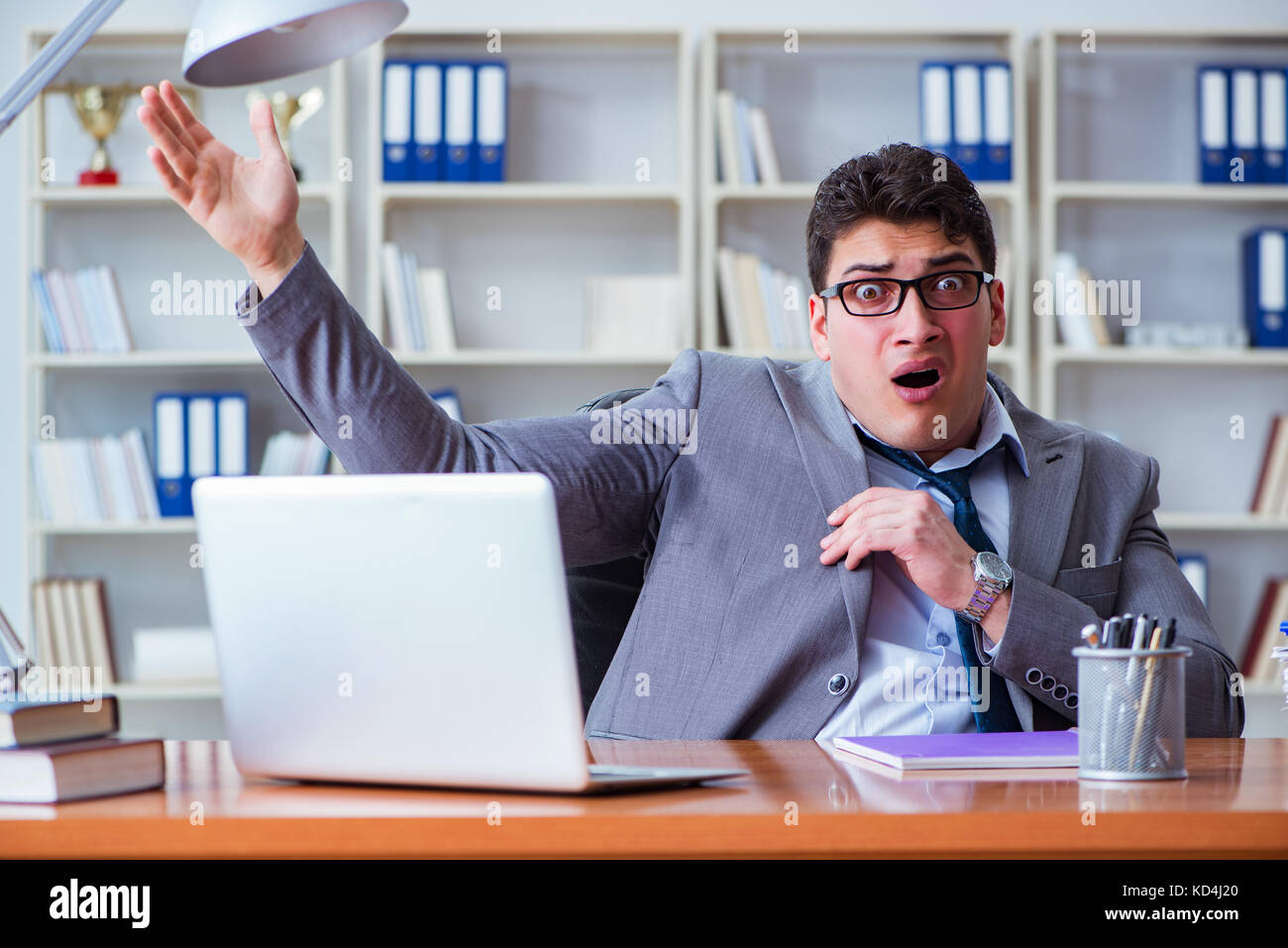 Businessman sweating excessively smelling bad in office at workplace ...