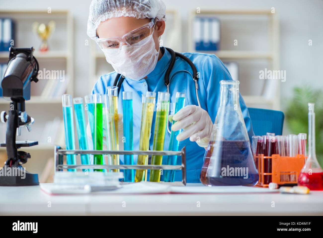 Female scientist researcher doing experiments in laboratory Stock Photo ...