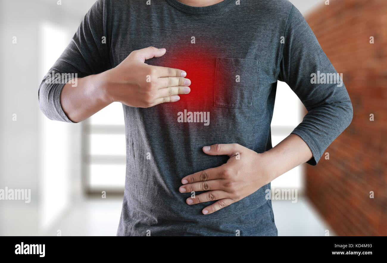 MAN with symptomatic acid reflux , suffering from acid reflux Stock ...