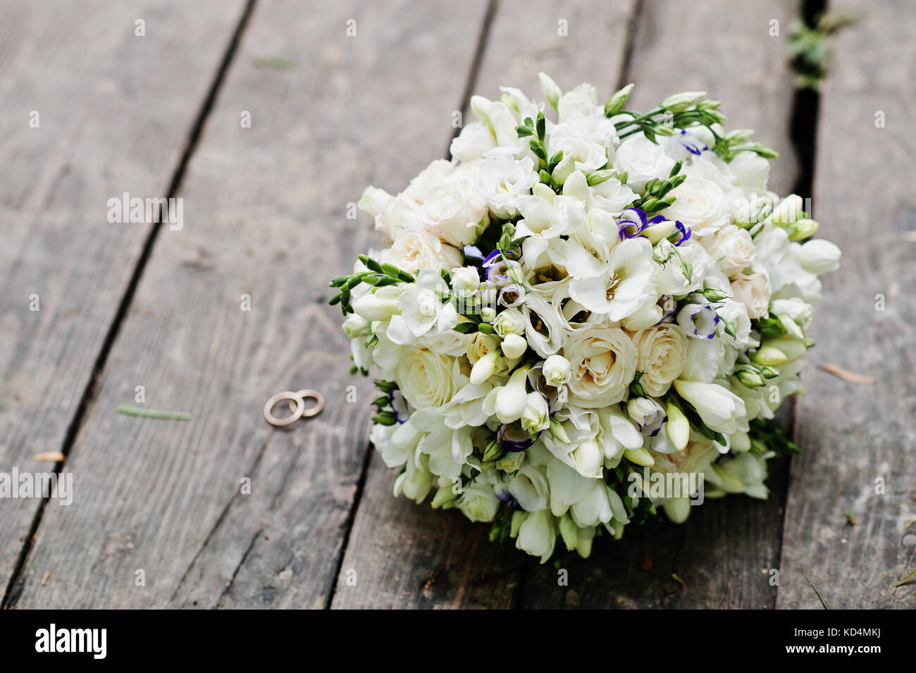 Two wedding rings laying on hi-res stock photography and images - Alamy