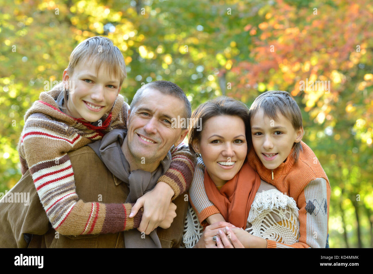 Pretty friendly family Stock Photo - Alamy