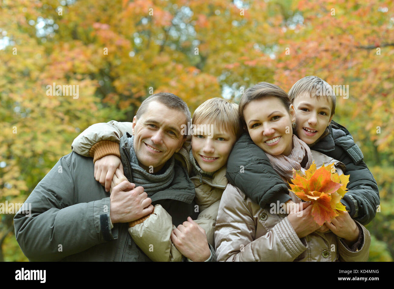 Pretty friendly family Stock Photo - Alamy