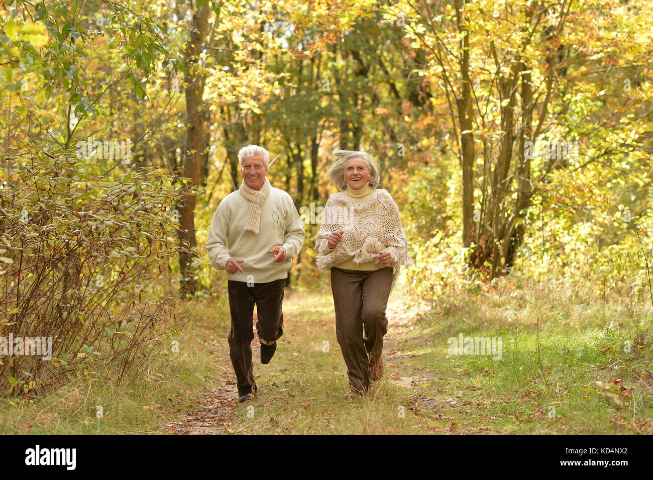 senior couple running in the park Stock Photo - Alamy