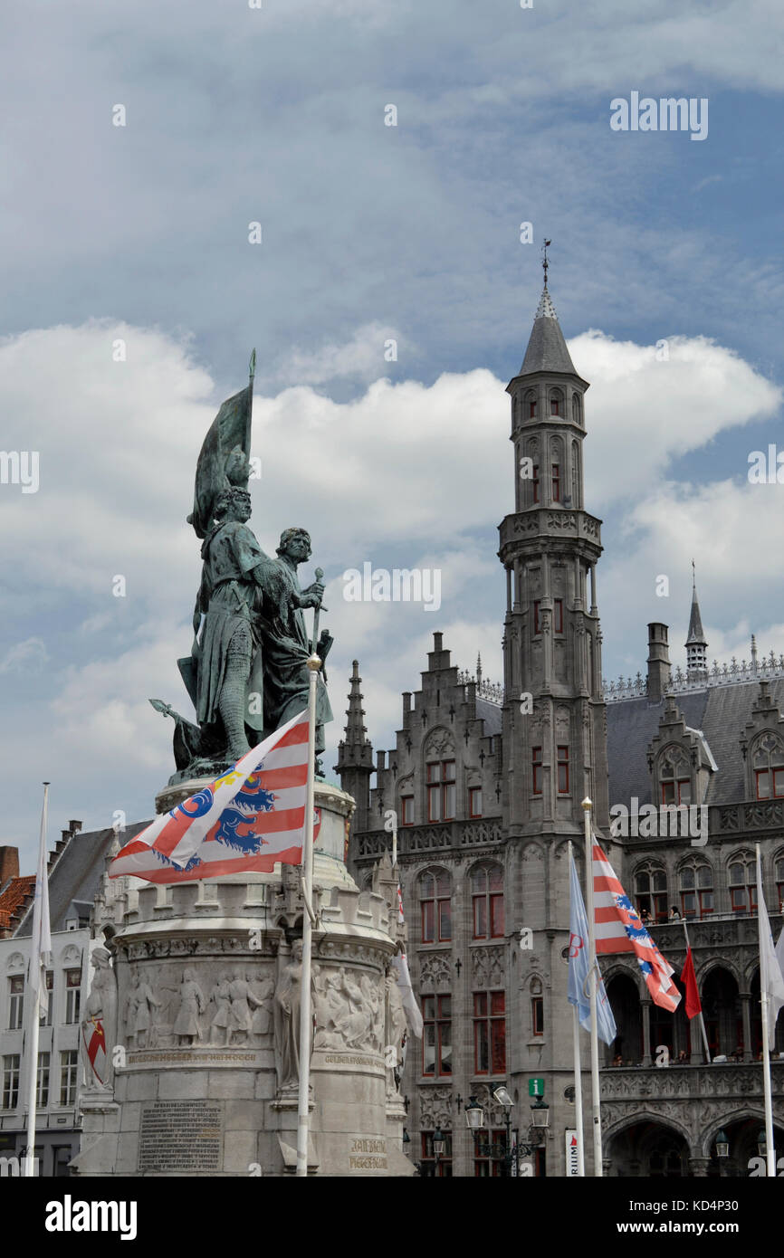 Landmark in Bruges with the statues and the Historium near the square ...