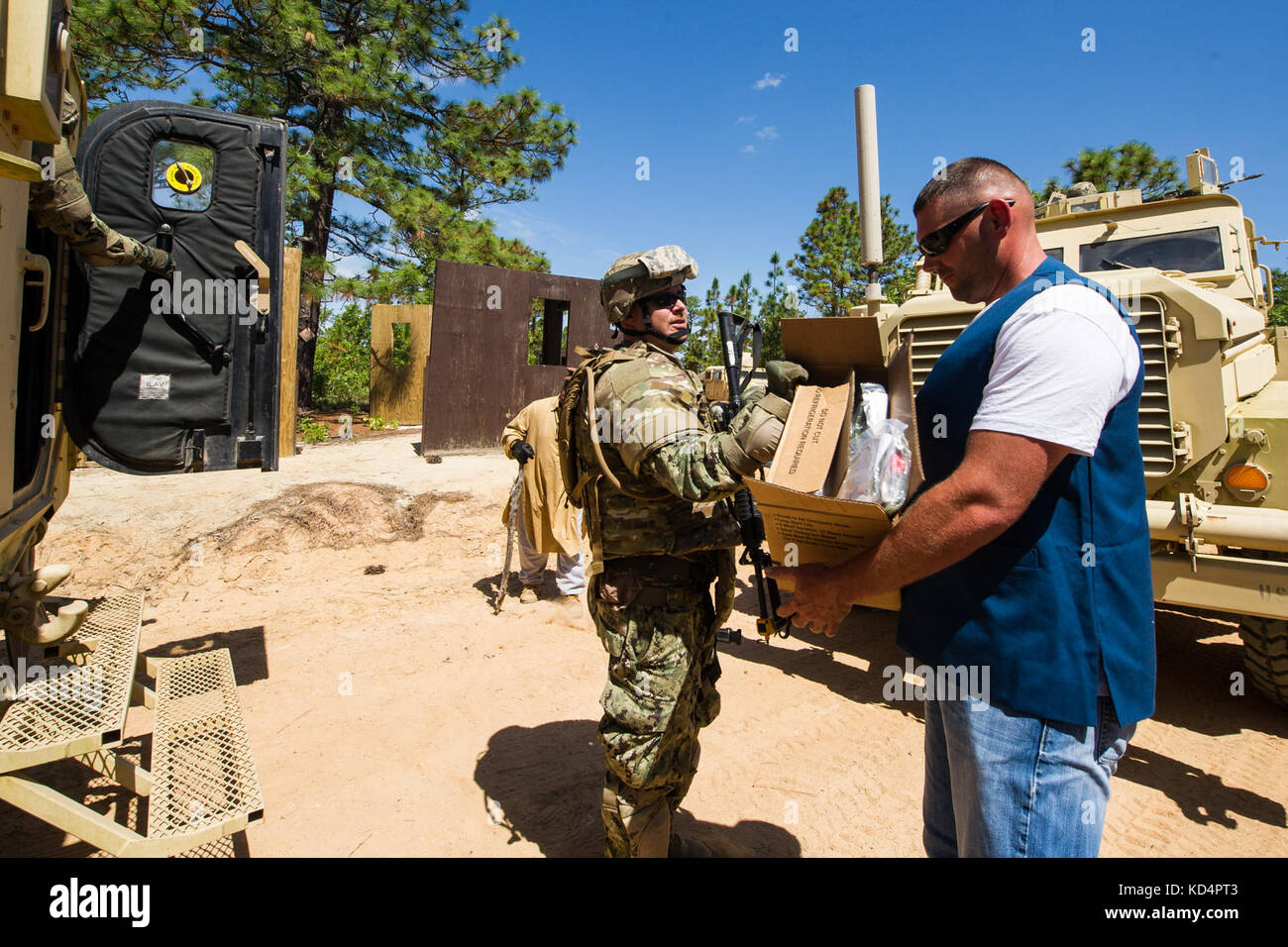 U.S. Navy Senior Chief Builder Norris Roush temporarily assigned to the ...