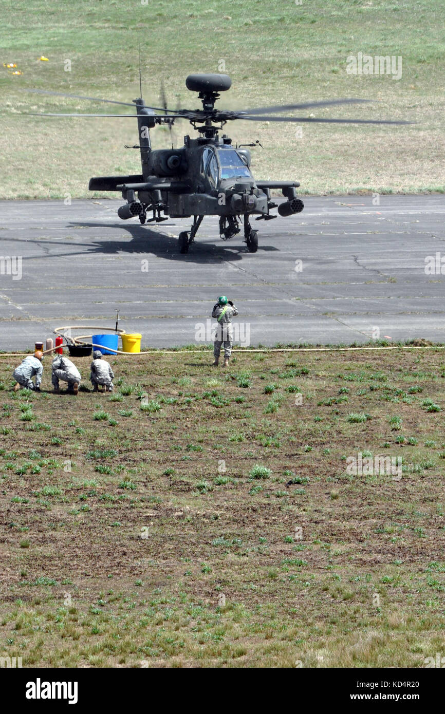 AH-64 Apache helicopters from the 1-151st Attack Reconnaissance ...
