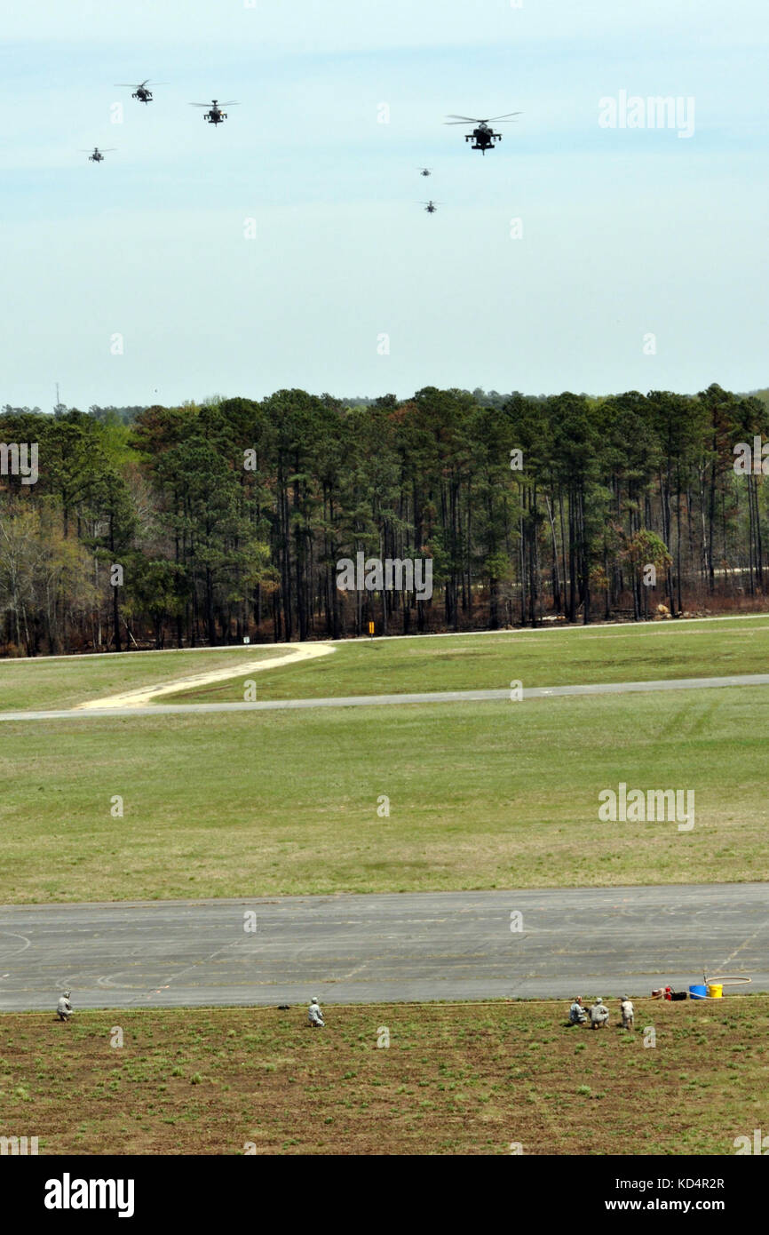 AH-64 Apache helicopters from the 1-151st Attack Reconnaissance ...