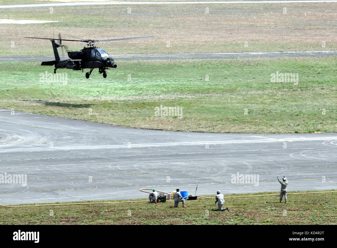AH-64 Apache helicopters from the 1-151st Attack Reconnaissance ...