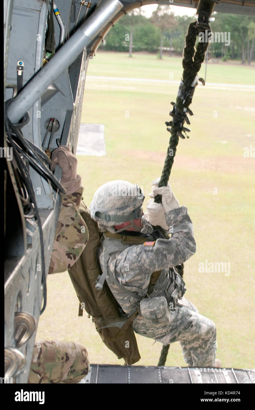 U.S. Army Spc. Brandon Rowell, a scout and sniper assigned to 4th ...