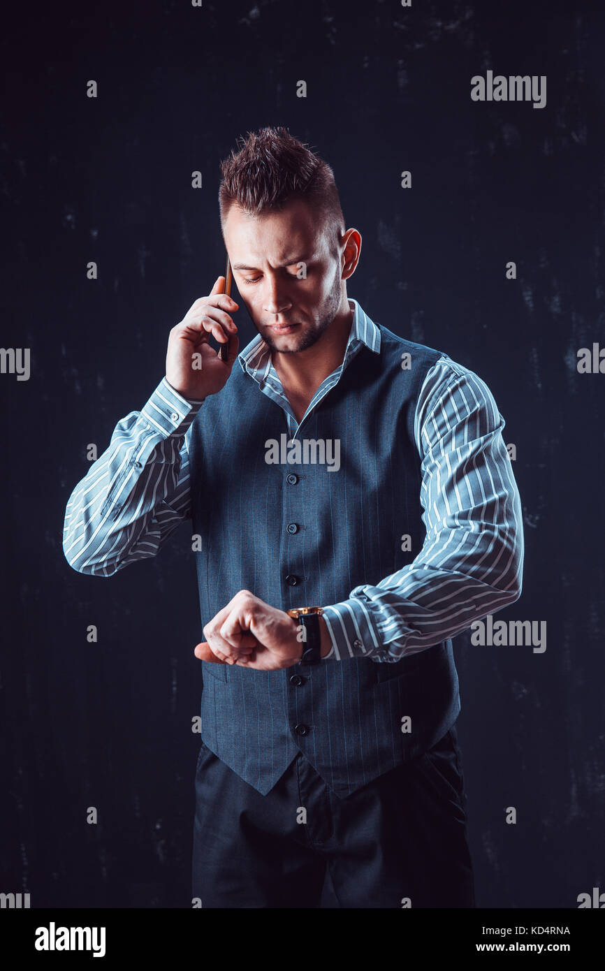 Stylish man talking phone Stock Photo - Alamy