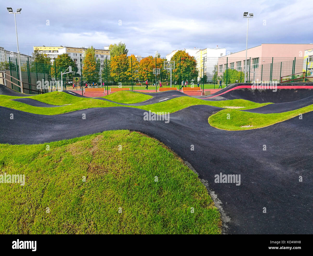 Bicycle track road. Located in city playground Stock Photo - Alamy