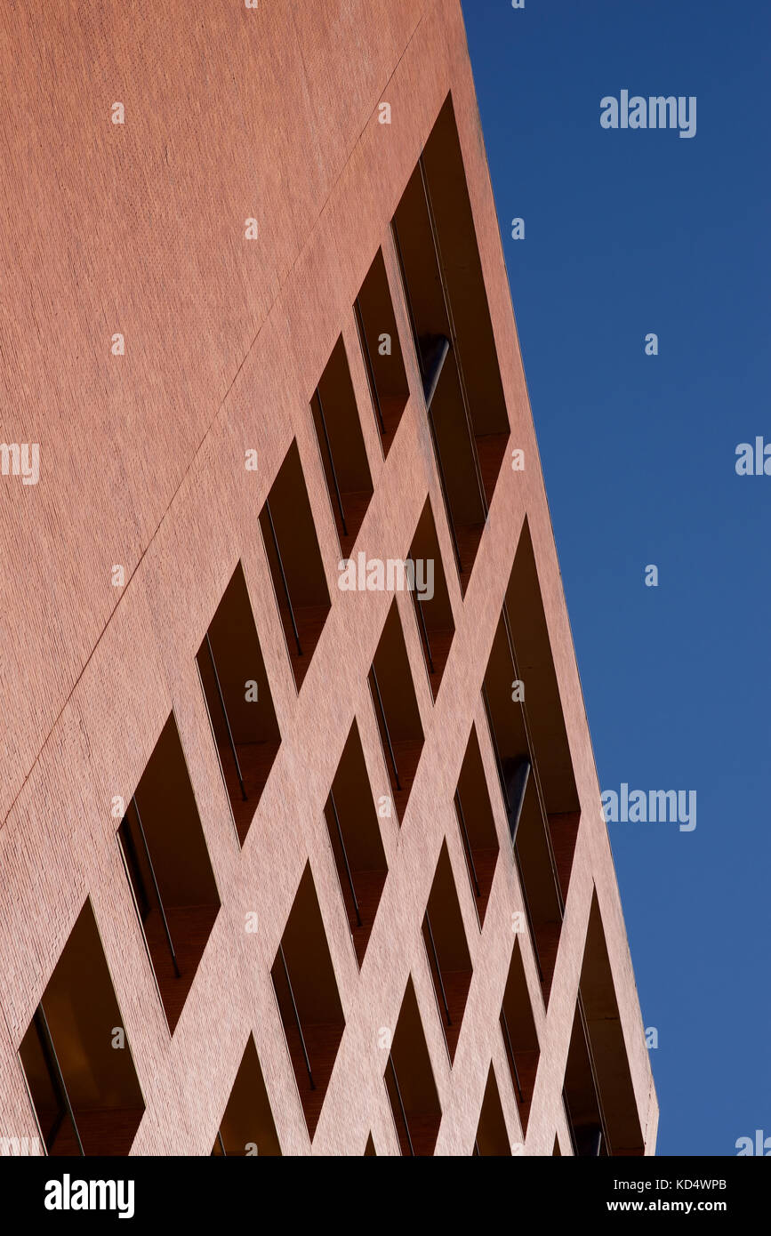 Abstract - brick built building against a blue sky Stock Photo - Alamy