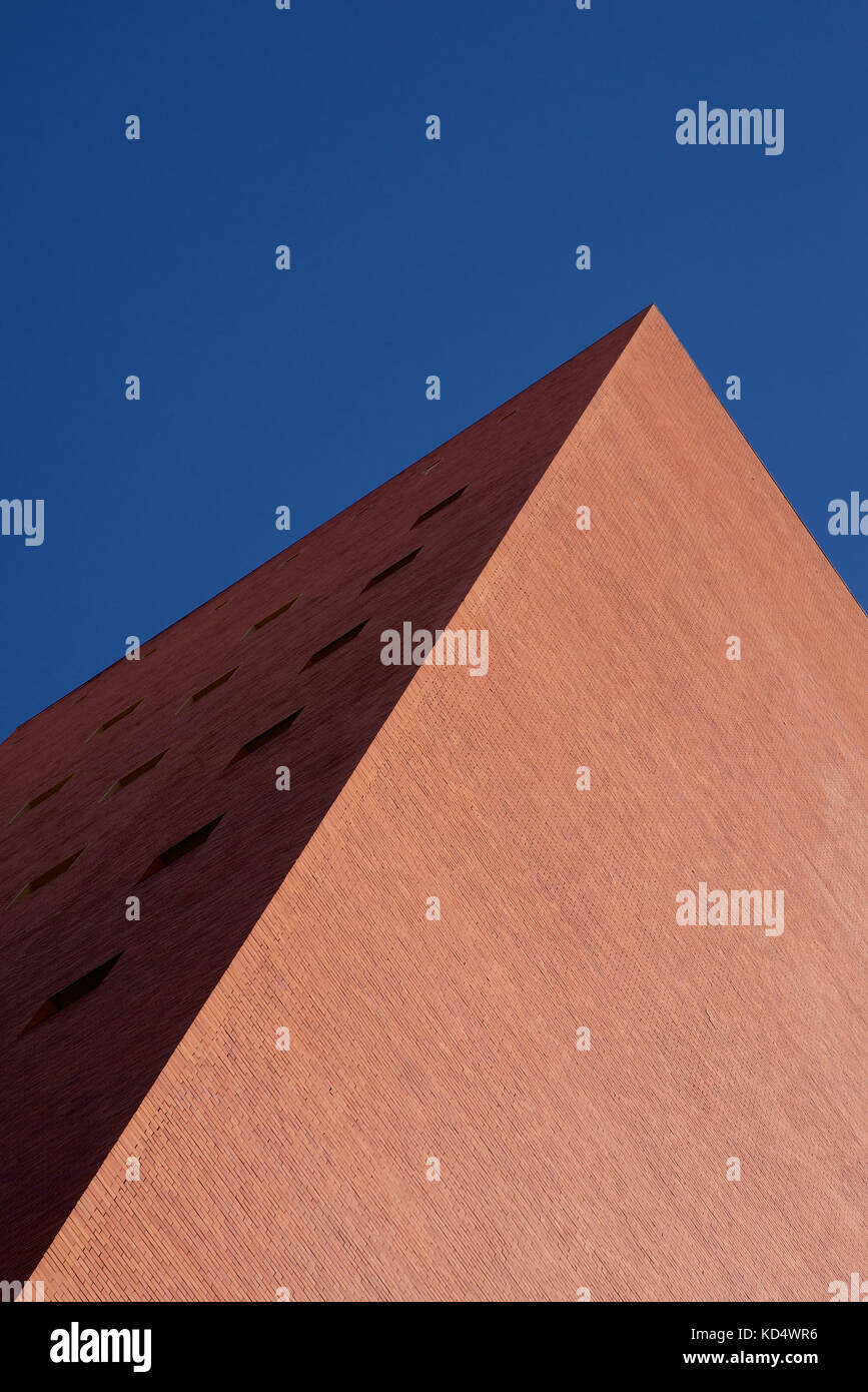 Abstract - brick built building against a blue sky Stock Photo - Alamy
