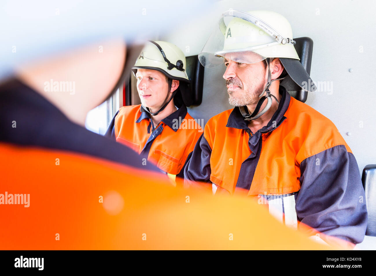 Fire fighters during operation briefing Stock Photo - Alamy