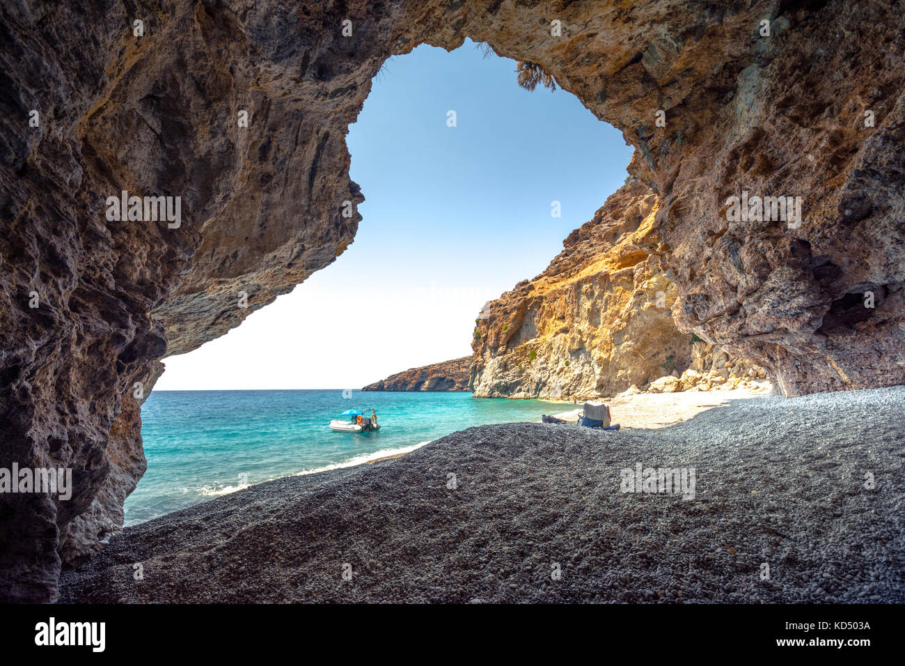 Amazing summer view from a cave at Iligas beach with magical turquoise ...