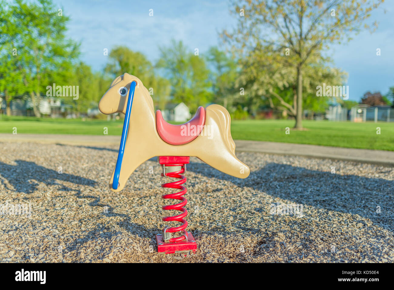 Playground with rocking horse hi-res stock photography and images - Alamy