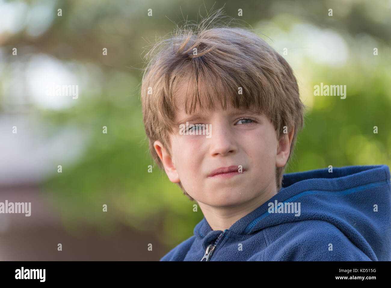 Portrait of a boy with blurred background Stock Photo - Alamy